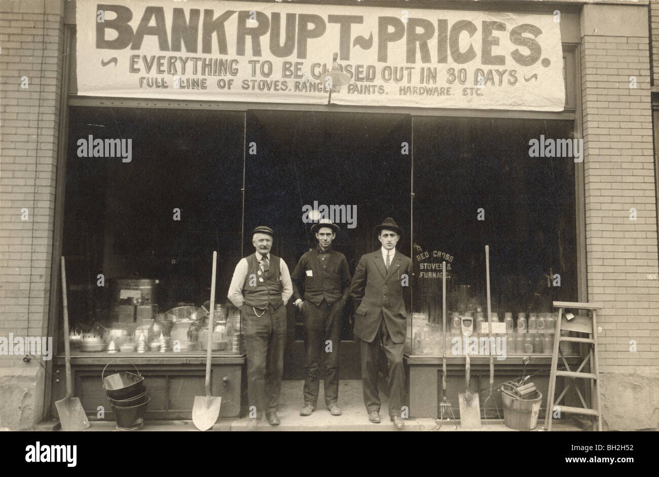 Three Men in front of Bankrupt Store Stock Photo - Alamy