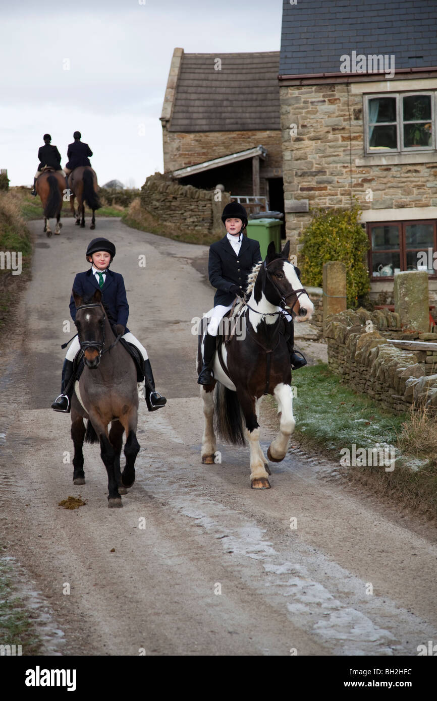 Two hunt riders on horseback out in the Derbyshire countryside Peak ...