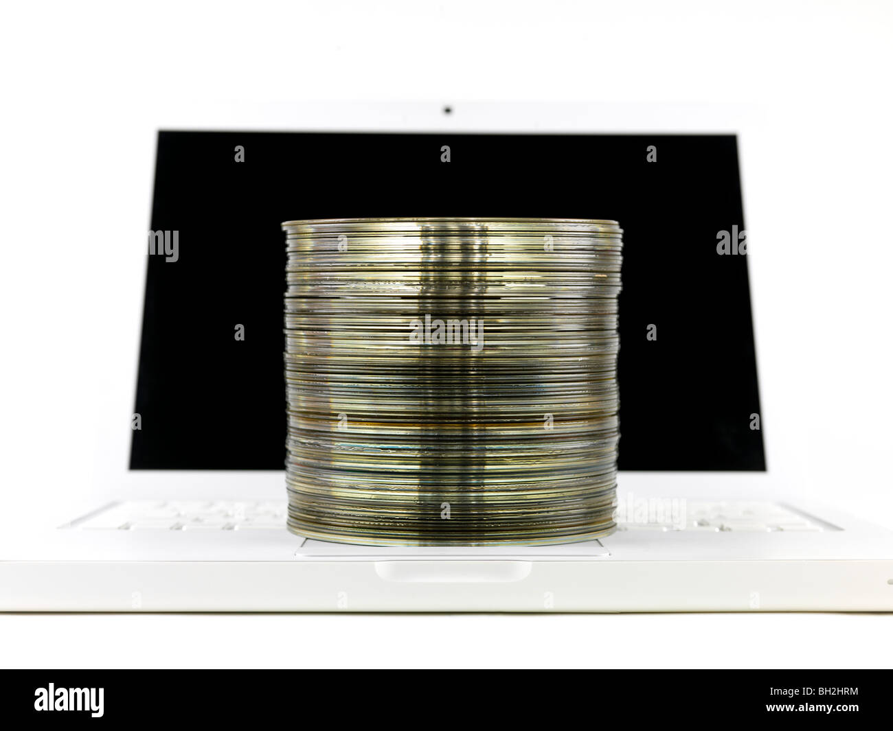 A stack of compact discs isolated against a white background Stock ...