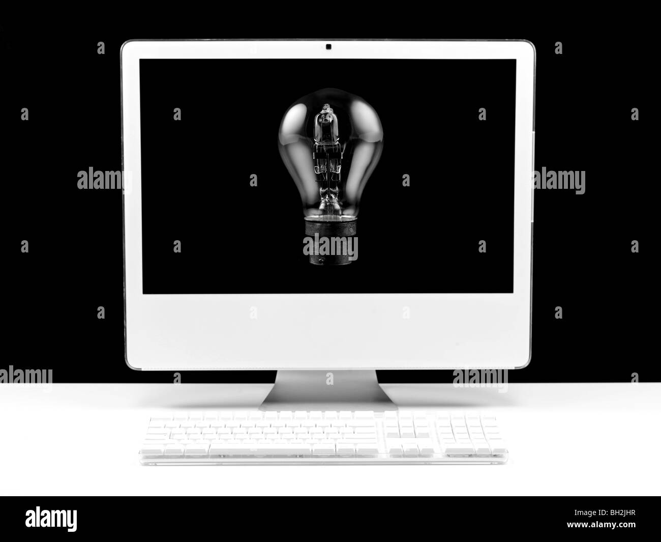 A contemporary workplace office desk with a black background Stock ...