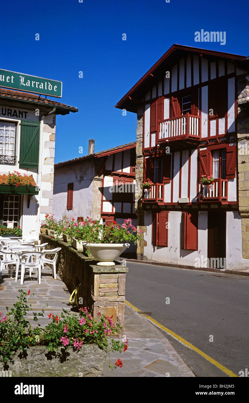 Basque architecture in the village of Ascain at the foothills of the ...