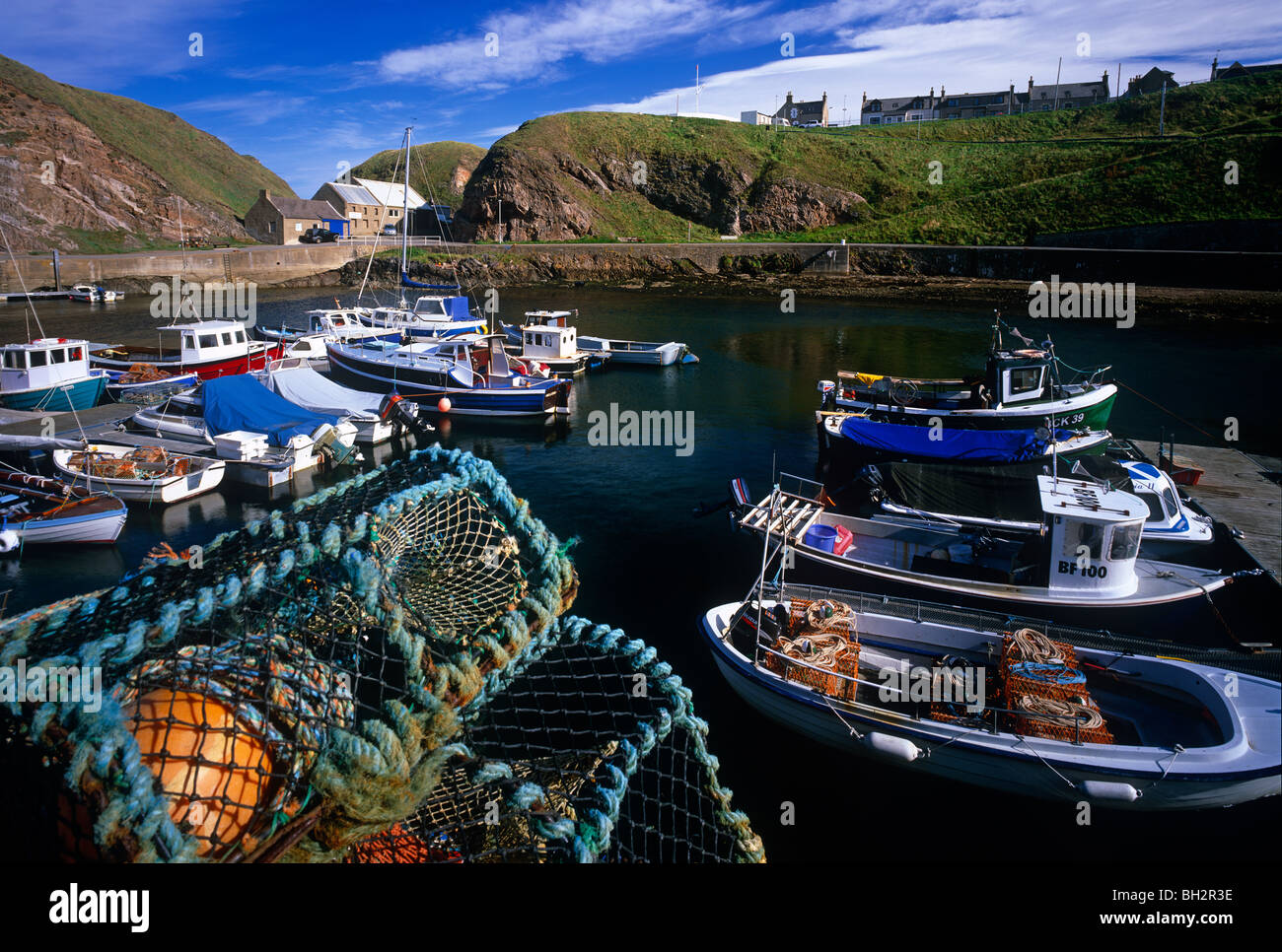 A view in summer of Portknockie harbour near Buckie on the Moray Firth ...