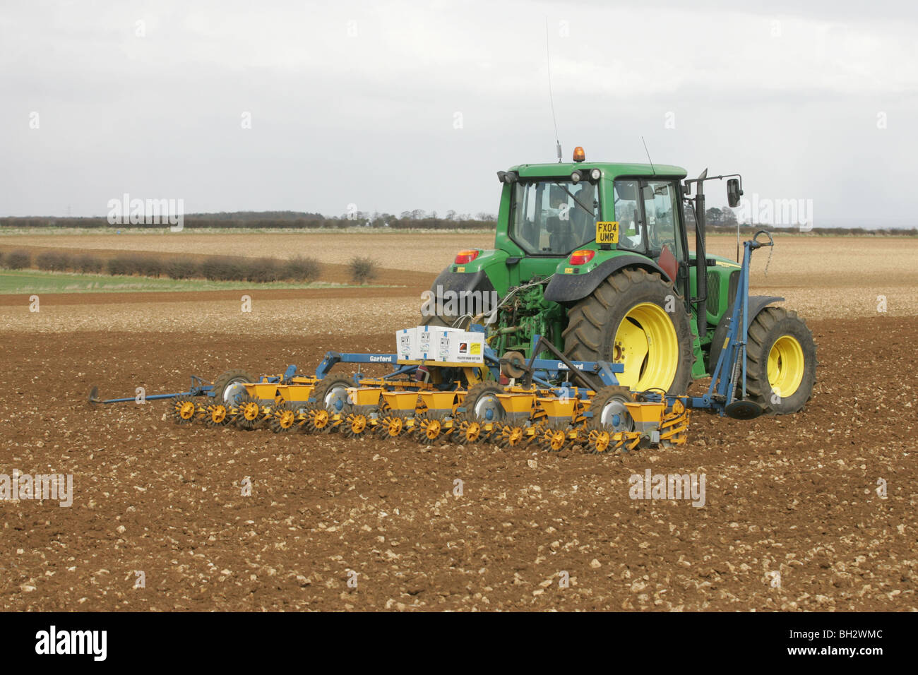 Tractor Drilling Sugar Beet Stock Photo - Alamy