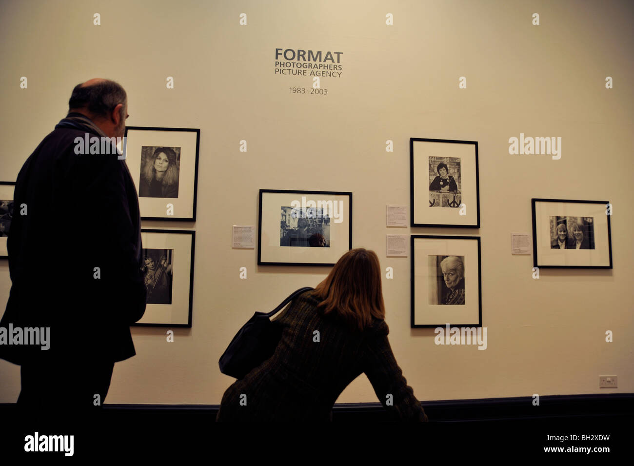 Viewing photographs hi-res stock photography and images - Alamy