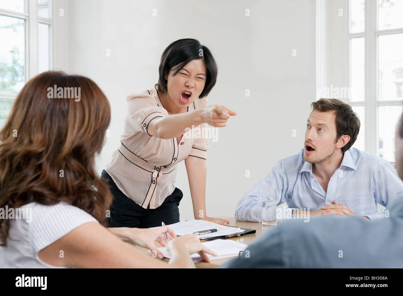 A group of angry people pointing hi-res stock photography and images ...