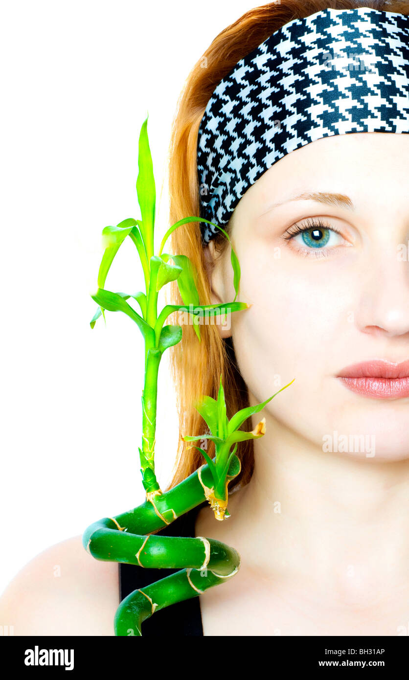 girl with a bamboo in a hand Stock Photo - Alamy