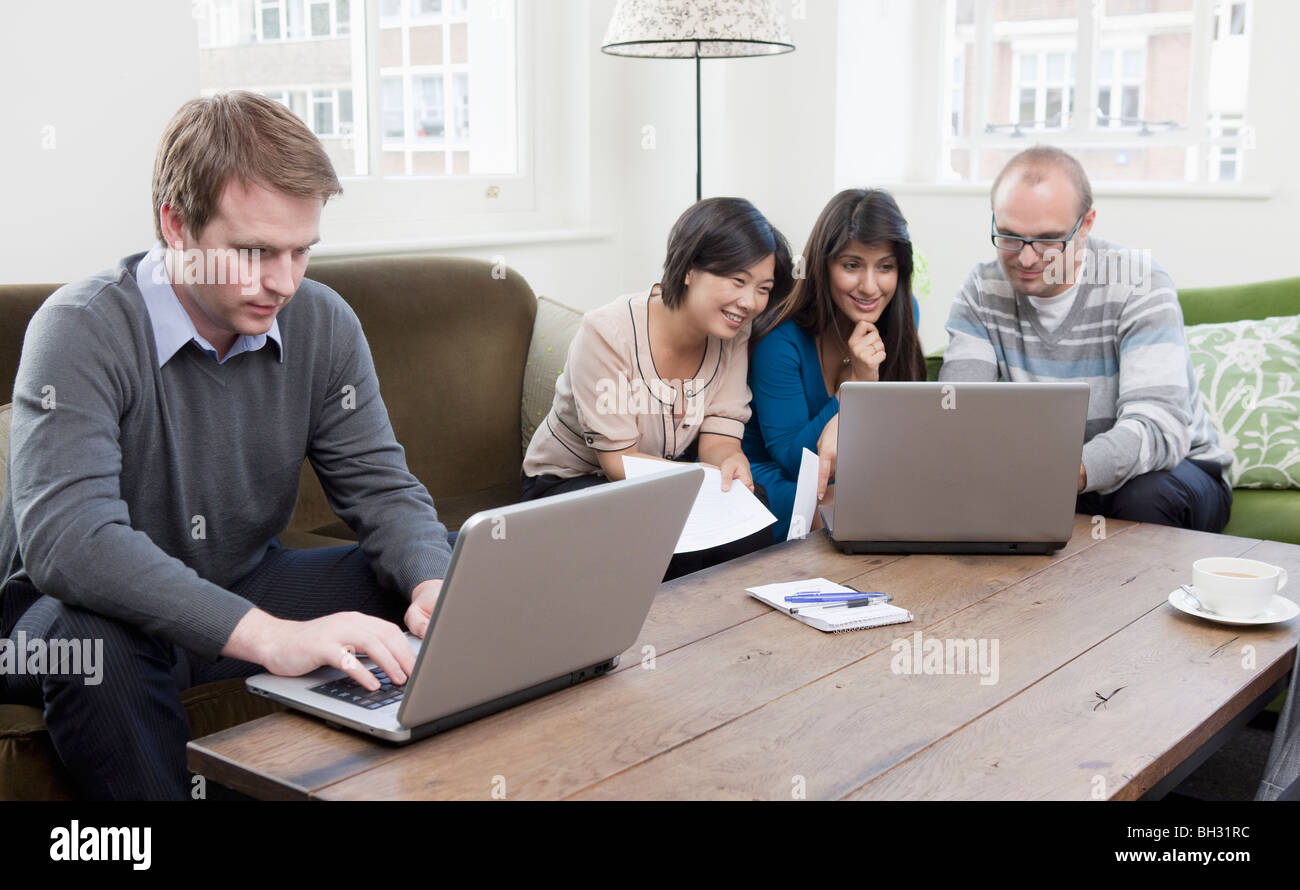 People working at casual office Stock Photo - Alamy