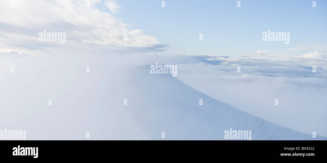 Summit of Corn Du emerges from clouds, Brecon Beacons national park ...