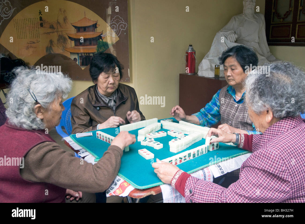 CHINA .Elderly women playing mahjong in a park in Kunming, Yunnan ...