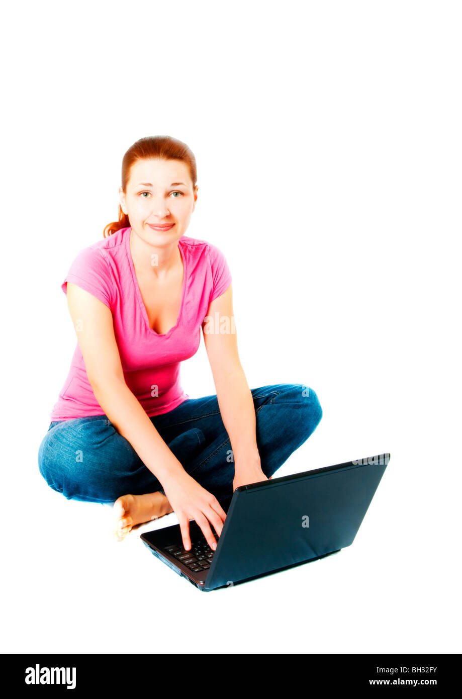 The girl with a computer. Isolation on white Stock Photo - Alamy