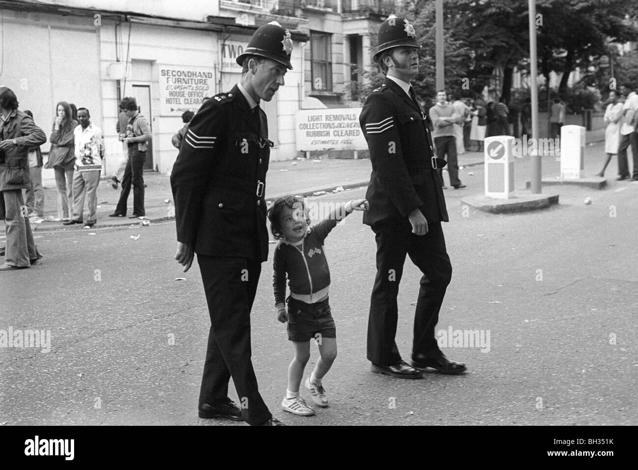 1970s police UK Notting Hill West London Policemen and small boy. 1979 ...
