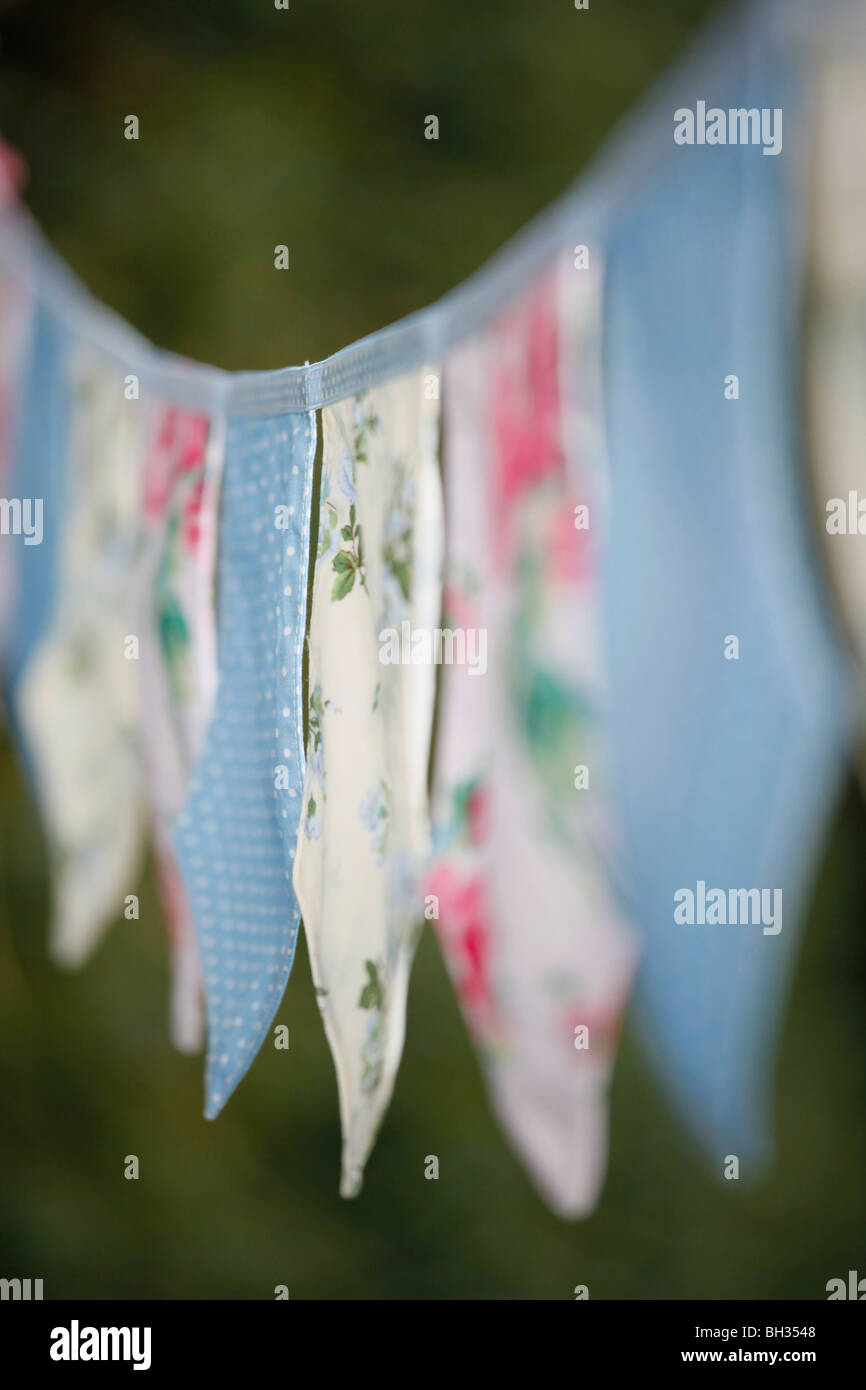 Fabric Bunting in a garden Stock Photo - Alamy