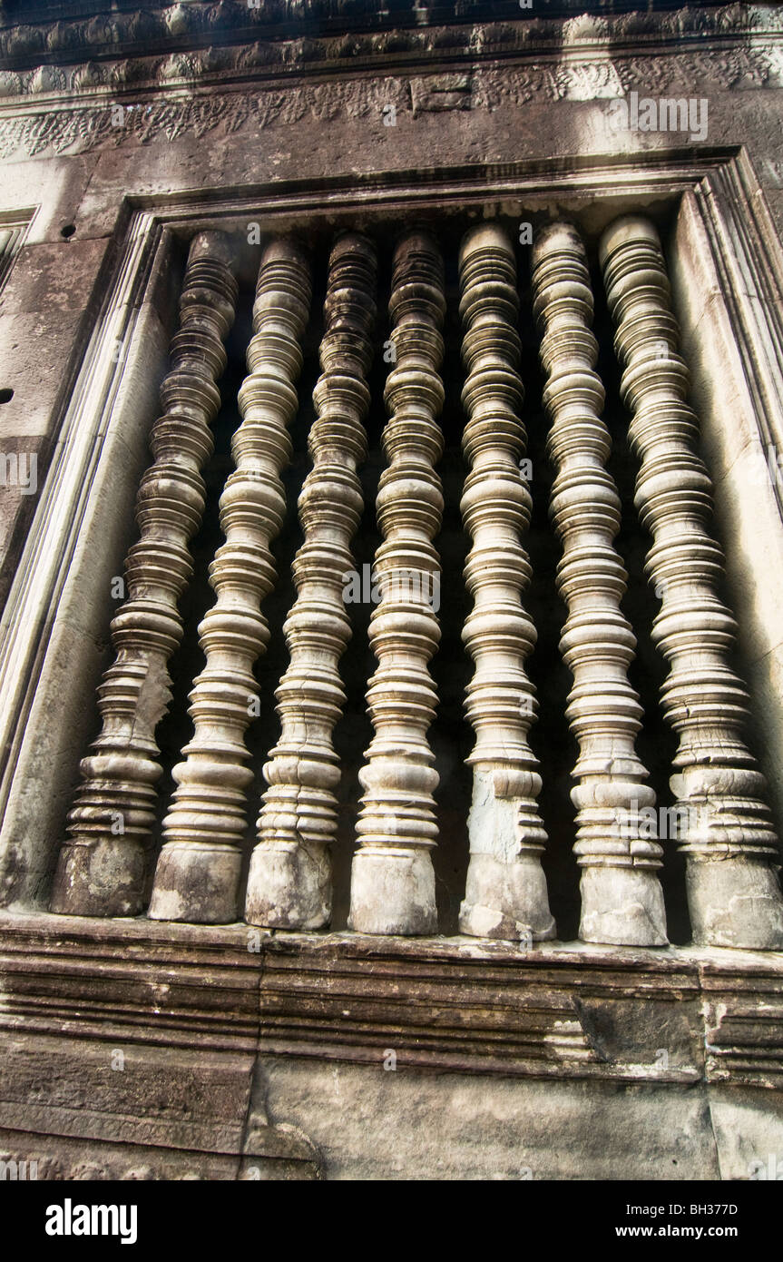 elaborately crafted design inside the ancient Khmer temples of Angkor ...