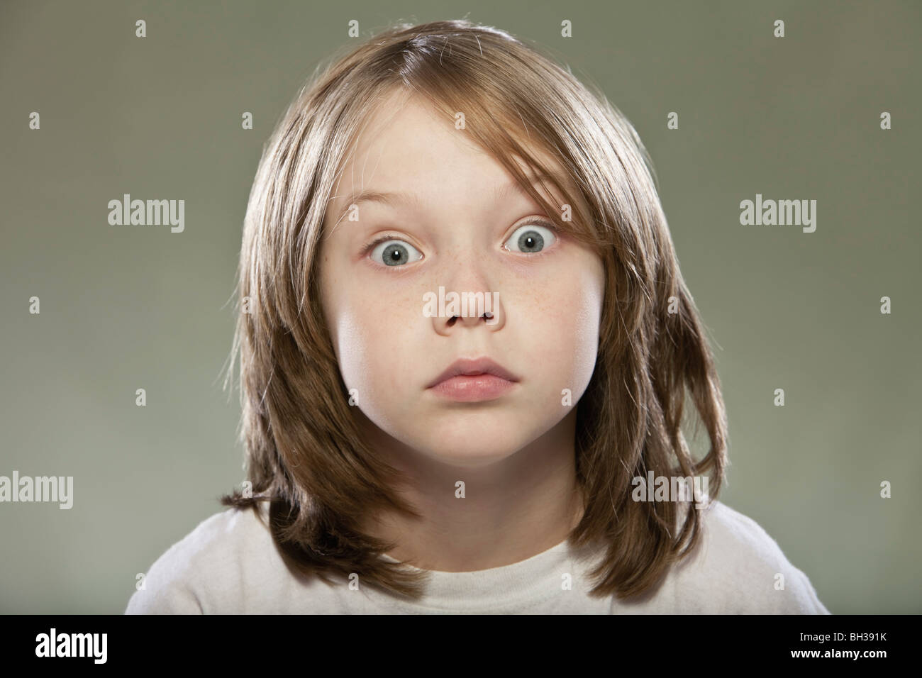 Boy with surprised look Stock Photo - Alamy