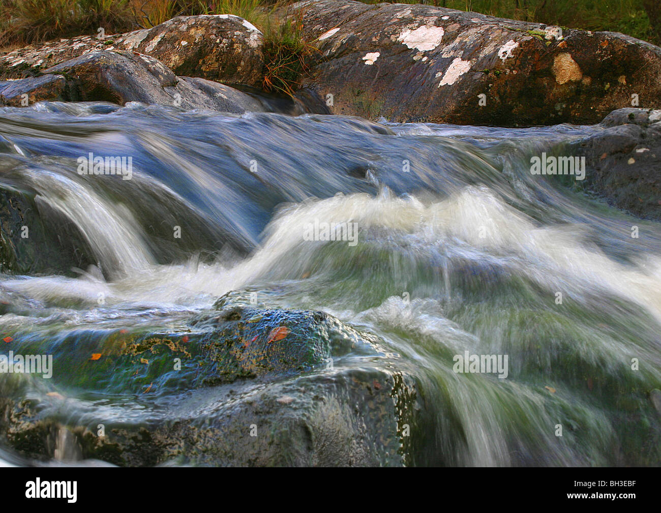 Water tumbling over rocks. Glen Affric, Scotland Stock Photo - Alamy