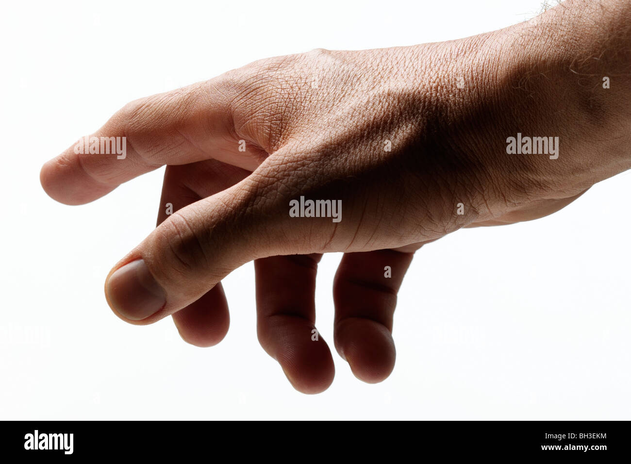 Mans hand pointing Stock Photo - Alamy