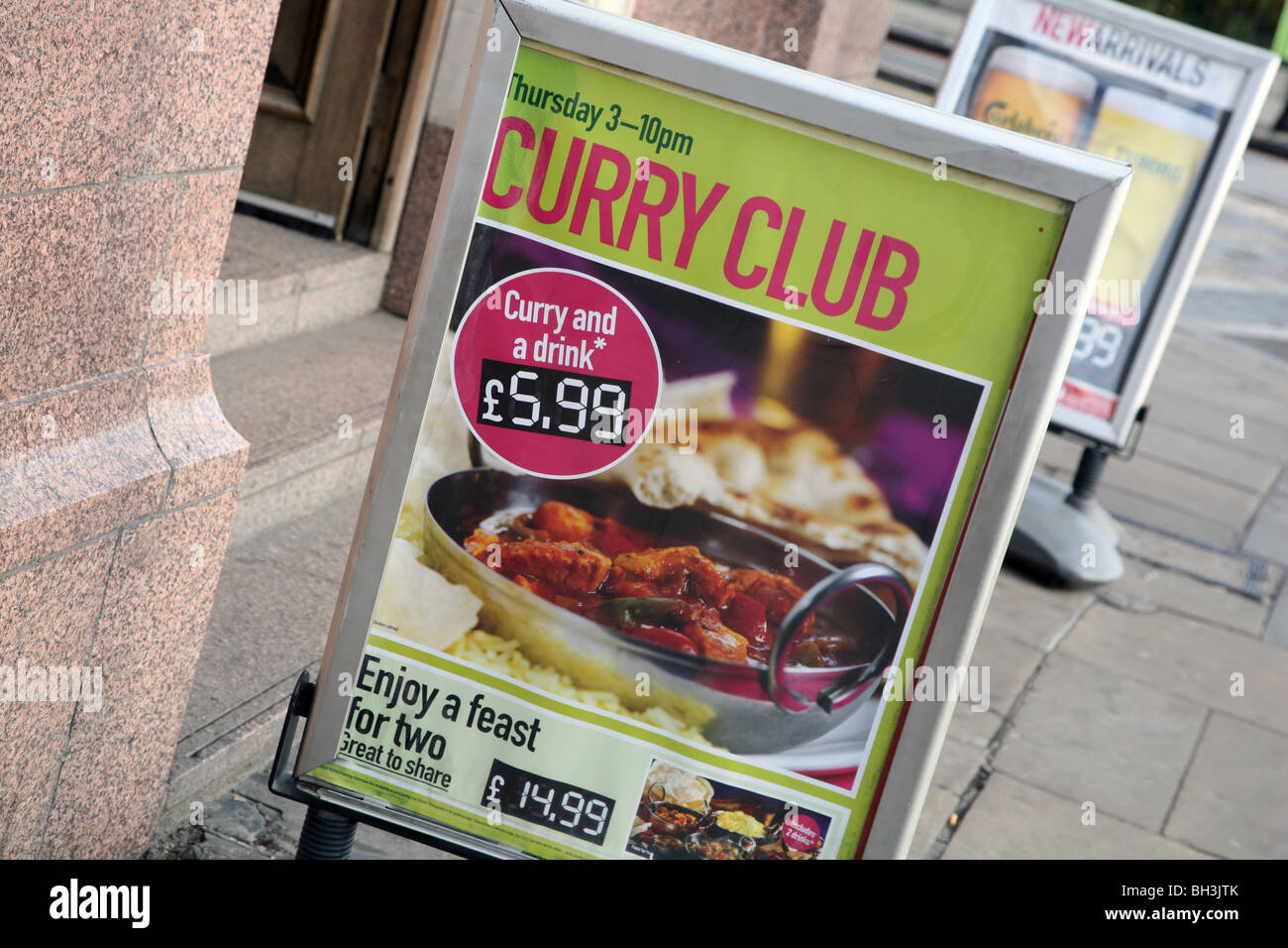 Curry Club sign outside London pub Stock Photo - Alamy