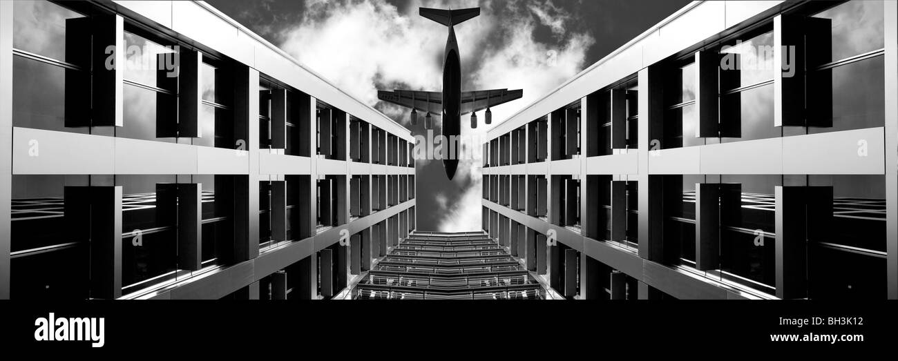 plane flying between 2 buildings Stock Photo - Alamy