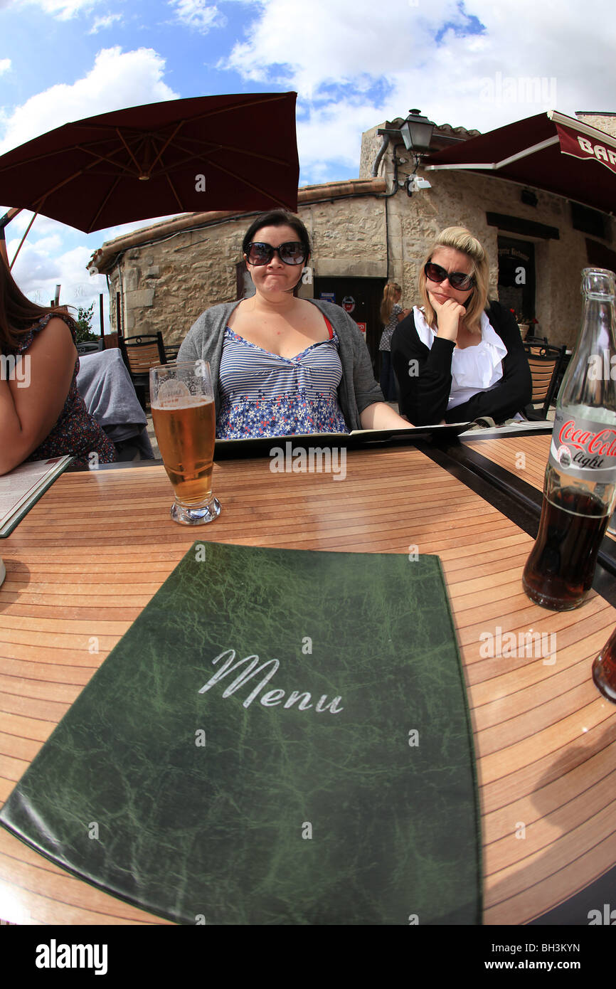 Friends wining and dining together Stock Photo - Alamy