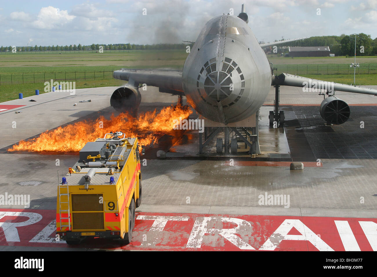 TRAINING DUTCH FIREFIGHTERS WITH AN AIRPLANE FIRE SIMULATOR, MODEL OF A ...