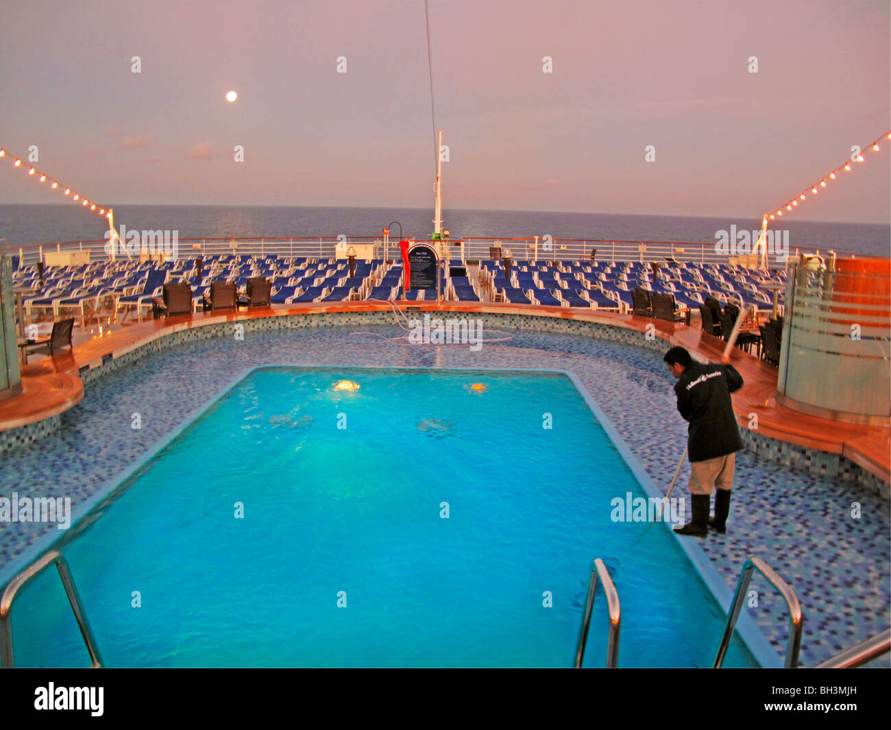 Eurodam cruise ship pool cleaning Stock Photo - Alamy