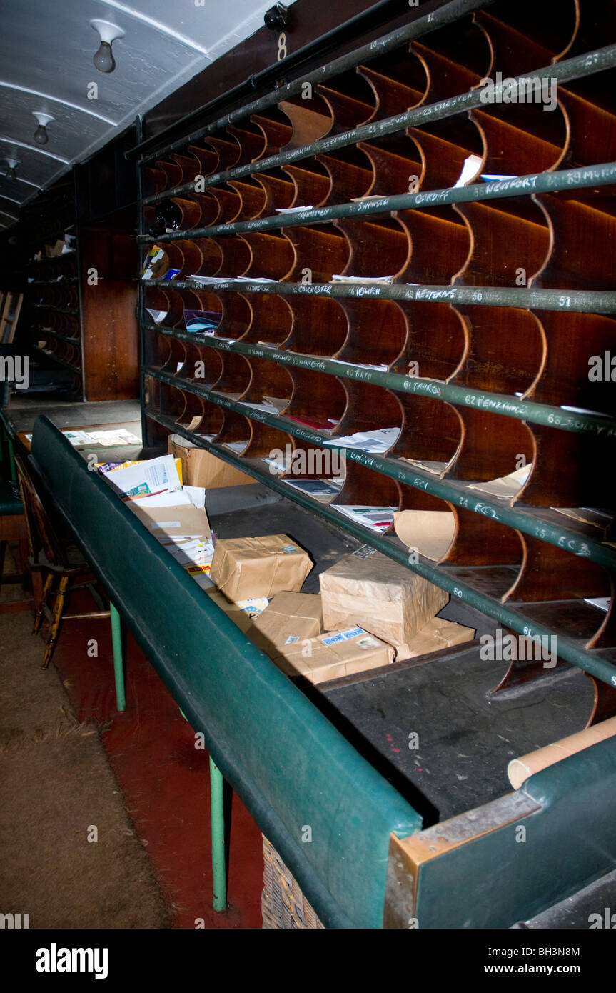 inside view of a traveling post office train carriage Stock Photo - Alamy