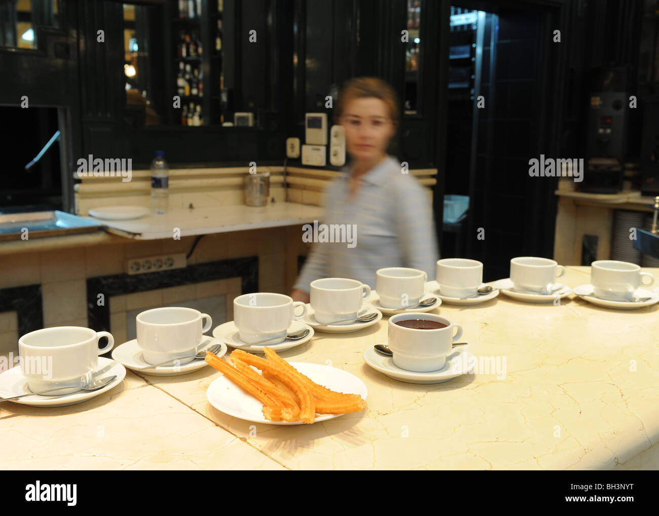 Churros and a chocolate drink at Chocolateria San Gines in Madrid ...