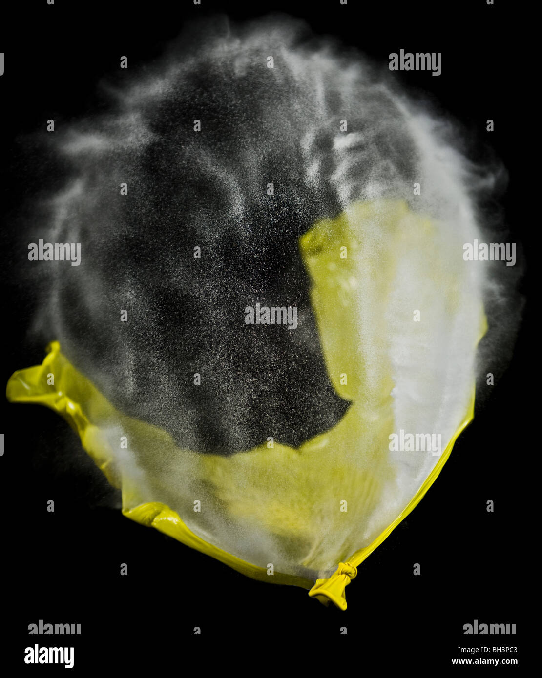 Balloon captured in the process of bursting. High speed photography ...