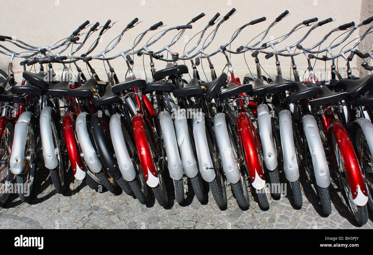 Row of bicycles in Munich, Germany, The bikes are cruisers with wide ...