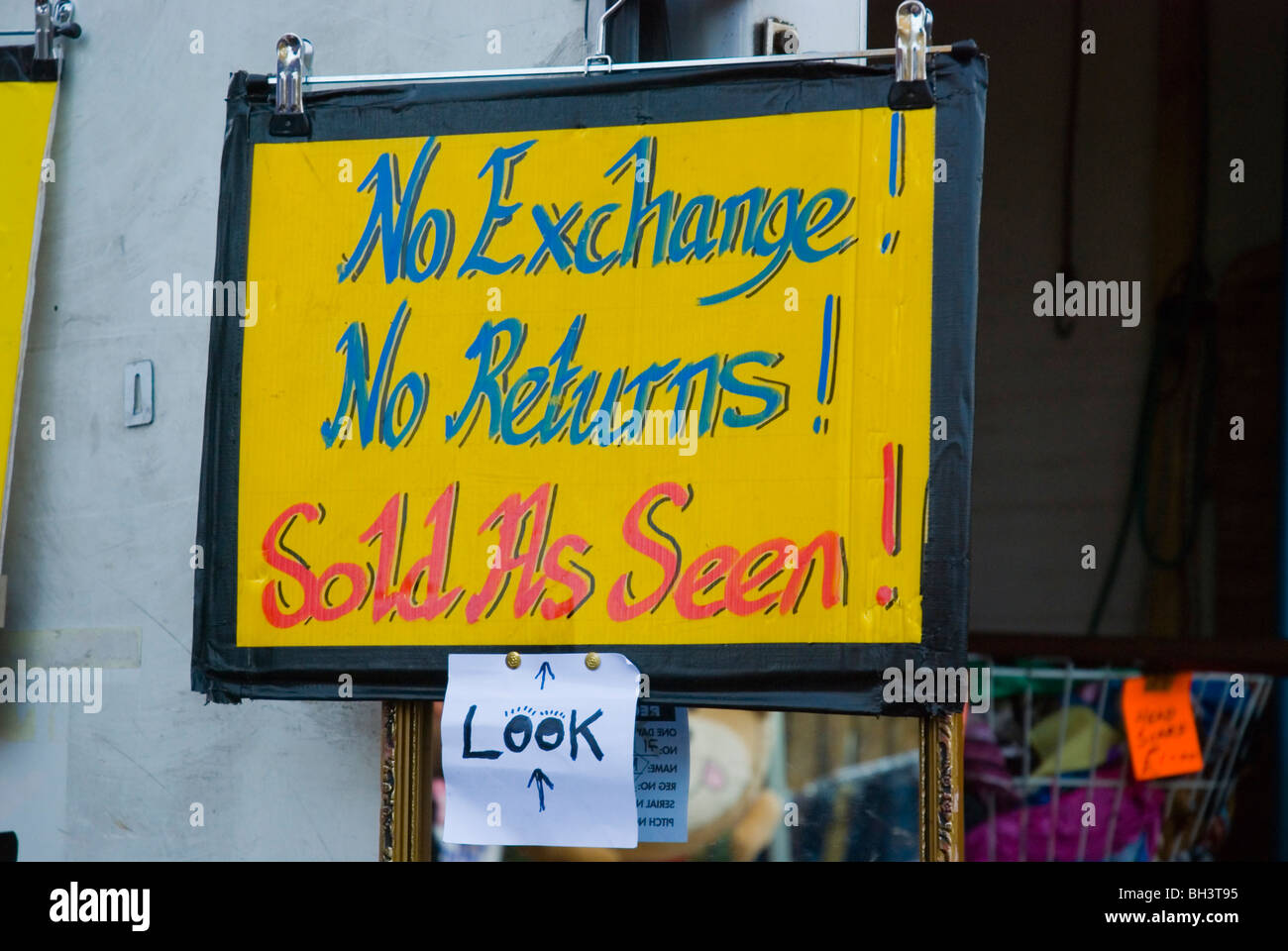 Sign of a used clothing stall Portobello Road market London England UK ...