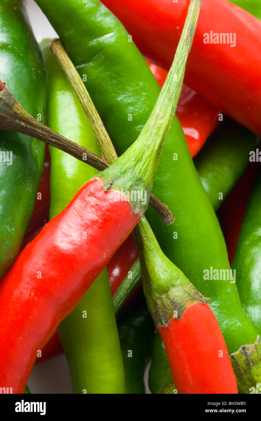 Red and green burning pepper Stock Photo - Alamy