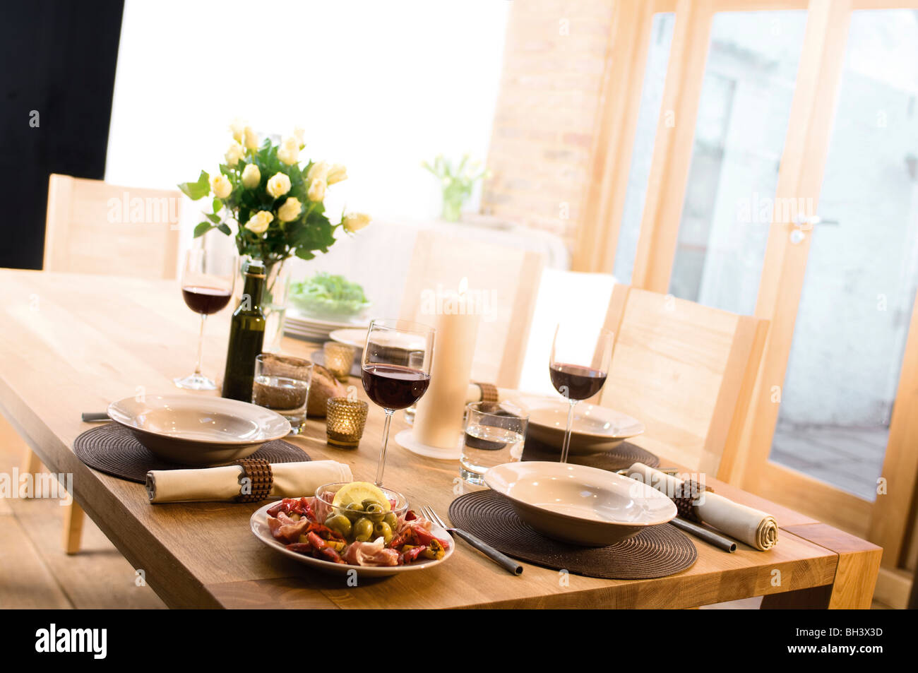 Table setting for evening meal Stock Photo - Alamy