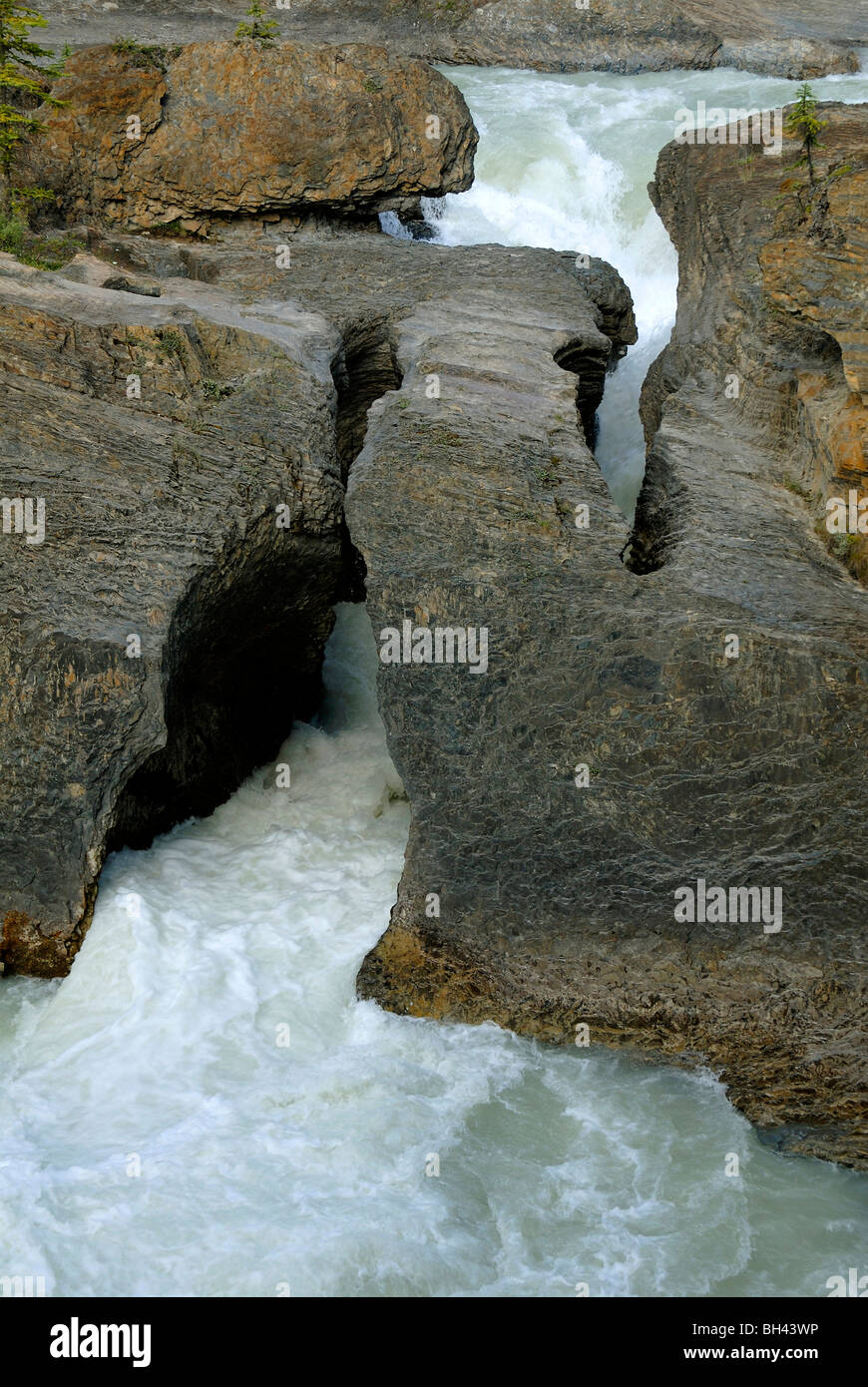 View of the natural bridge structure with raging water underneath Stock ...