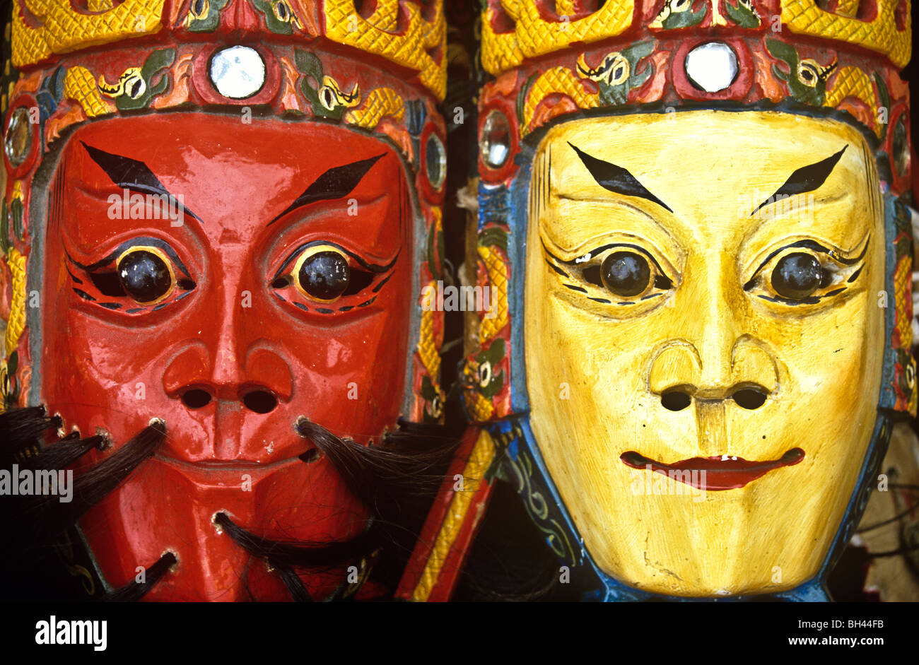Wooden opera masks for ground opera are produced by local Bouyei and ...