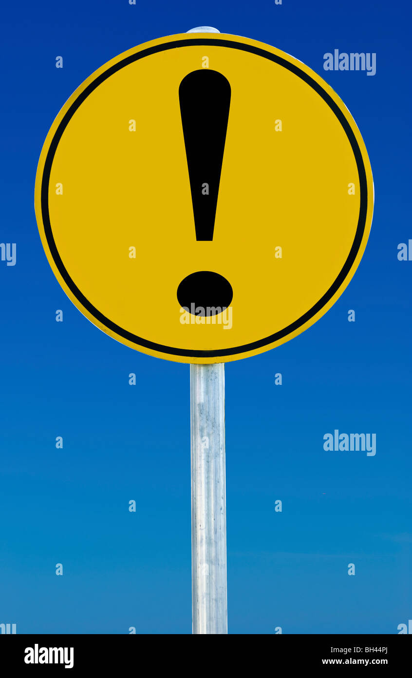 A road sign with an exclamation mark on it isolated on a blue sky Stock ...