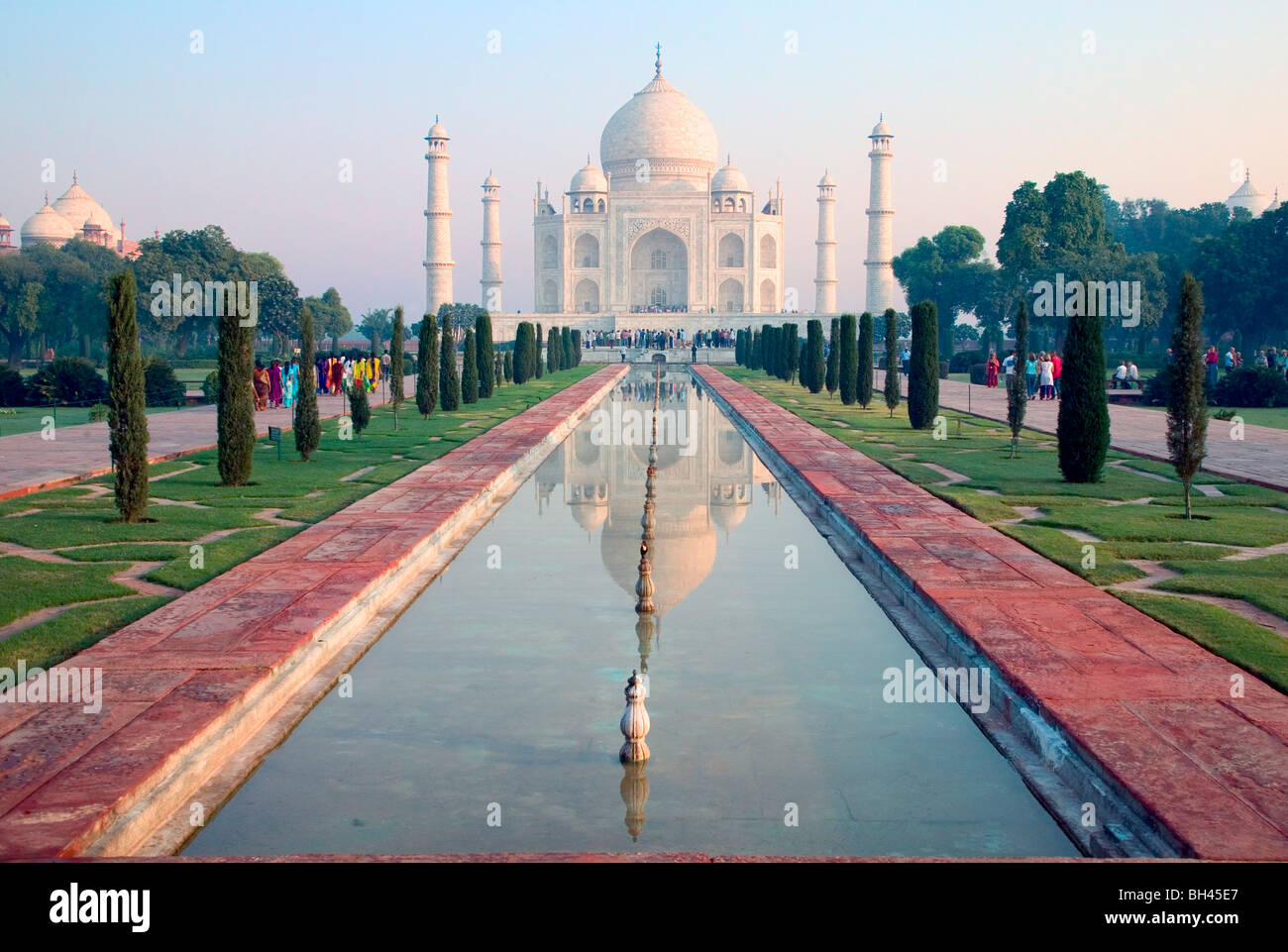 Classic view of the mausoleum of the Taj Mahal with reflecting pool in ...