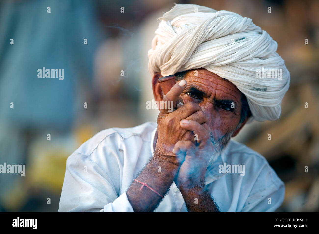 Camel trader smoking traditional pipe Stock Photo - Alamy