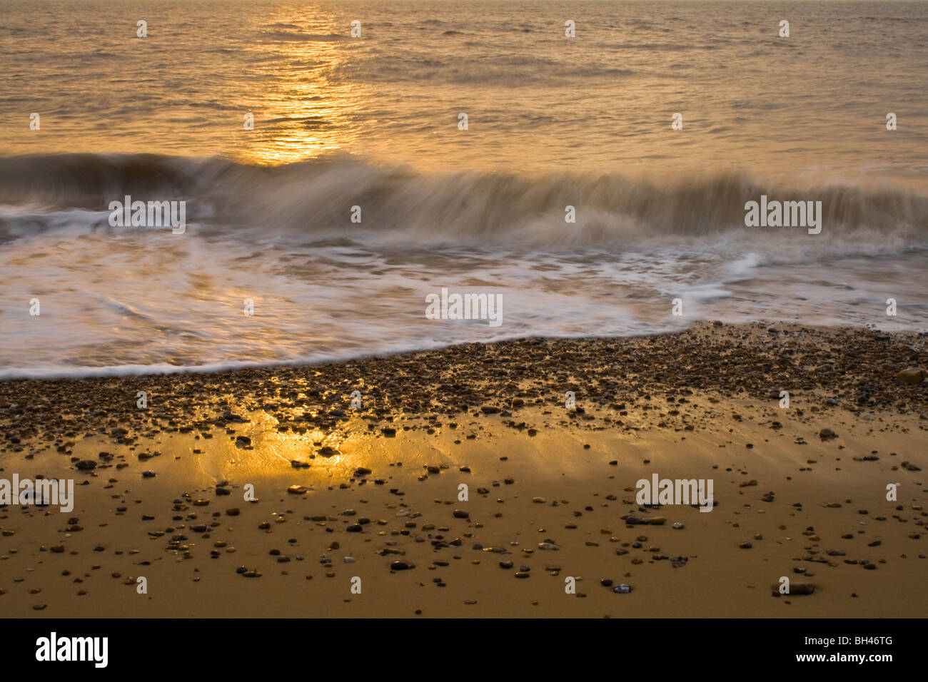 Early morning study of sea surf and sand at Southwold Stock Photo - Alamy