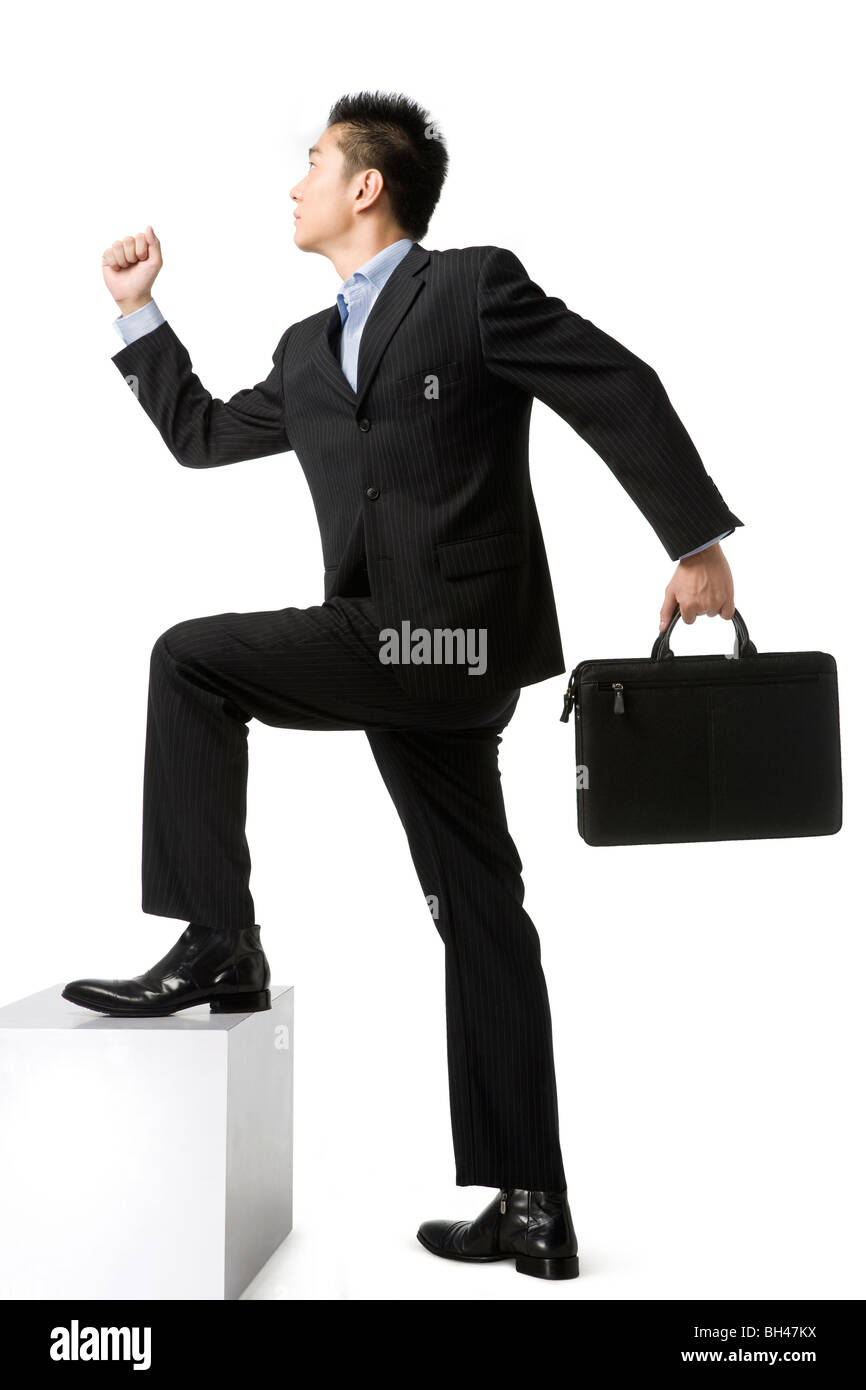 Businessman going to office Stock Photo - Alamy