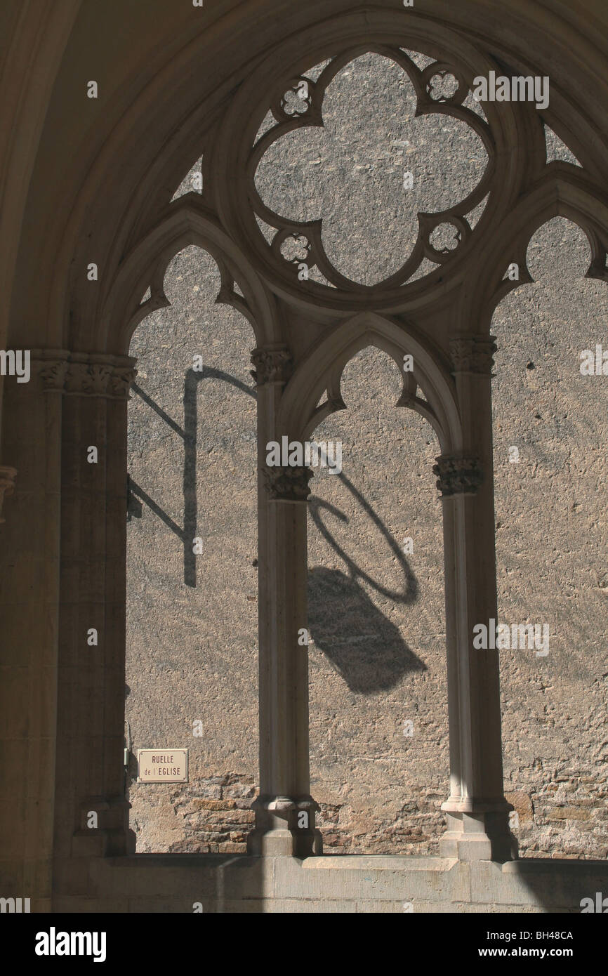 Shadow and silhouette of church's gothic arc on wall of the church ...