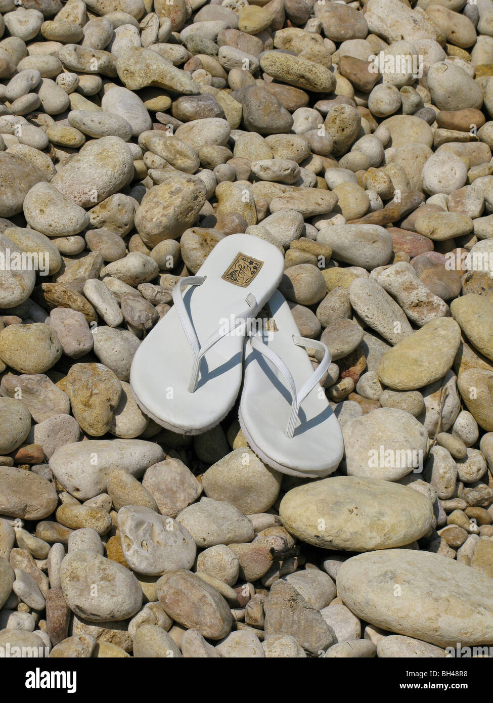 Flops on beach hi-res stock photography and images - Alamy