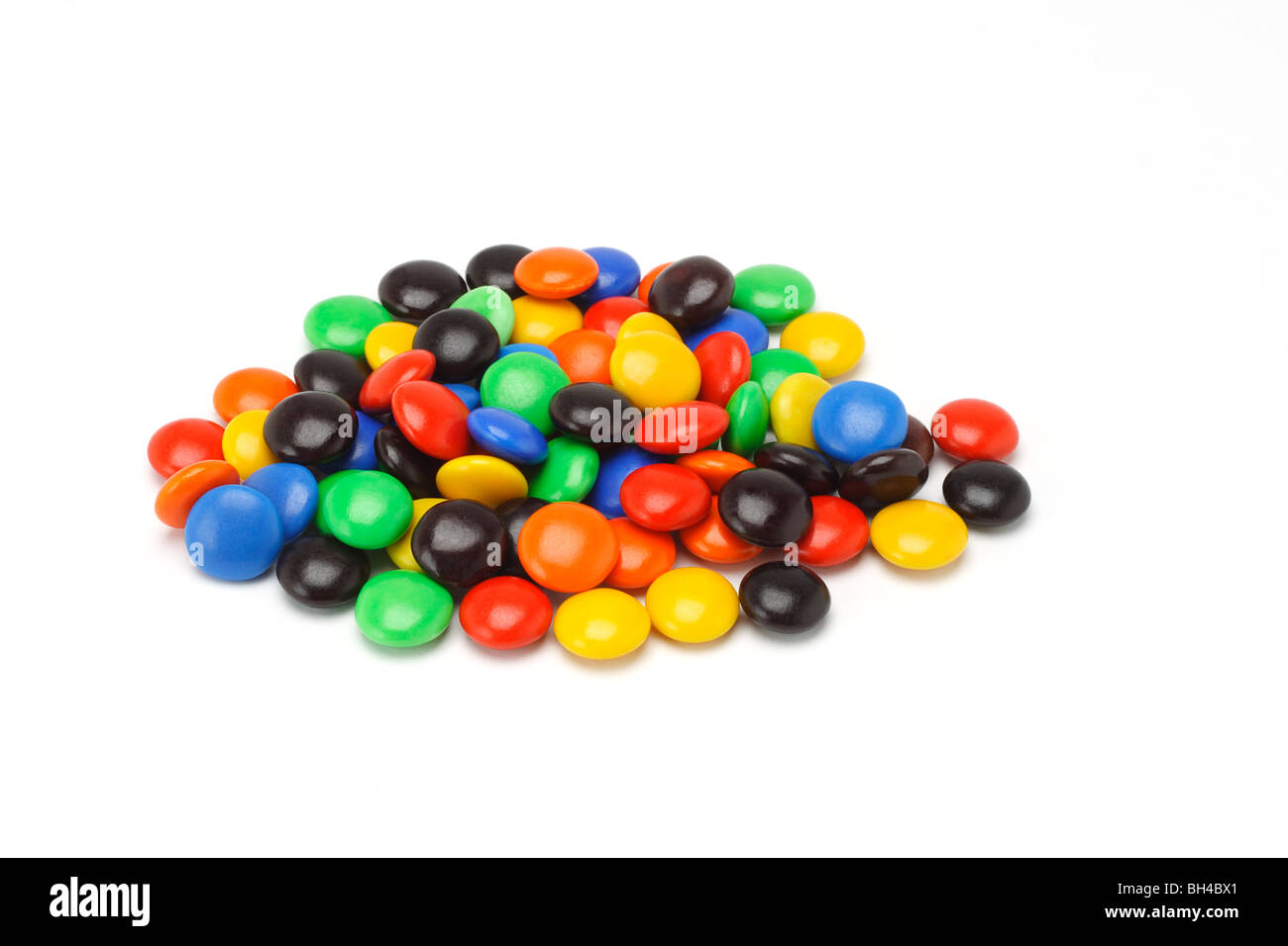 Colorful assortment of Chocolate button candies on white background ...