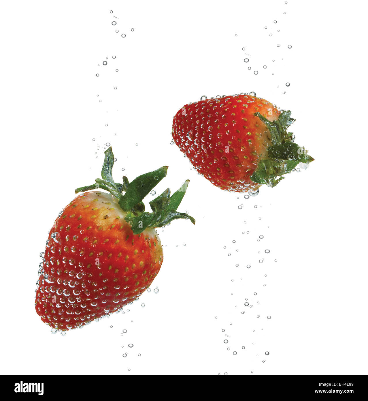 Strawberries in water Stock Photo - Alamy