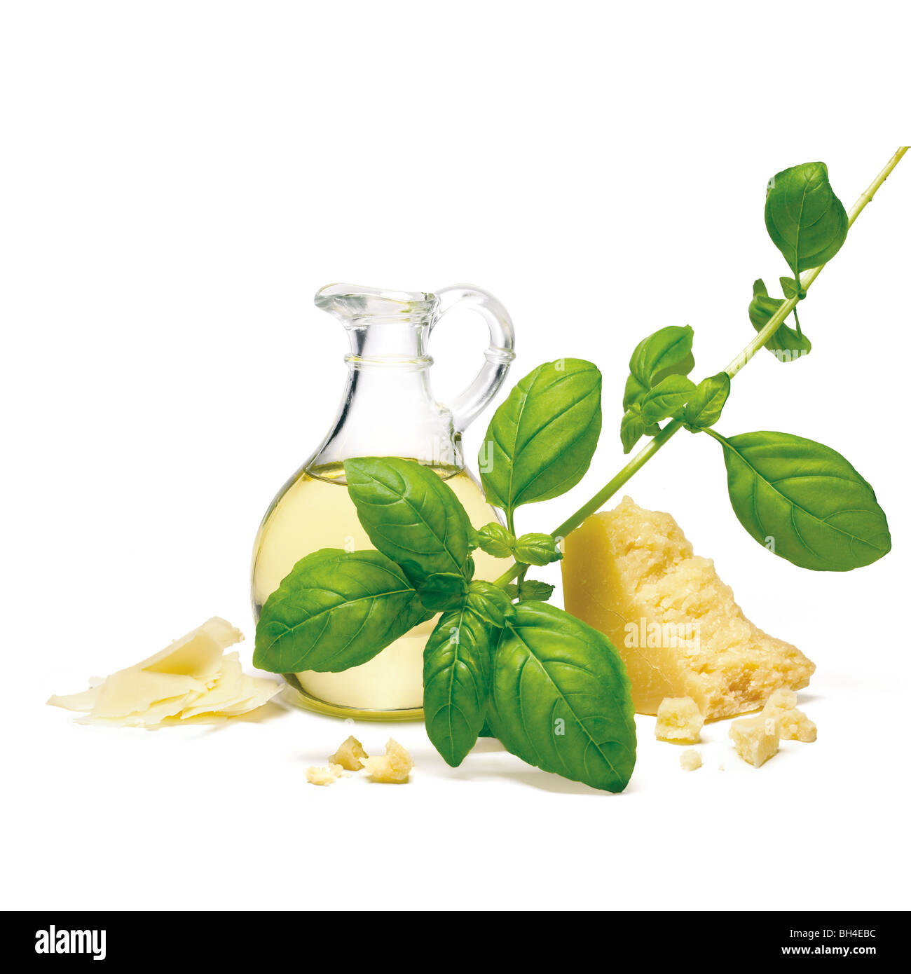 Basil, cheese and olive oil on a white background Stock Photo - Alamy