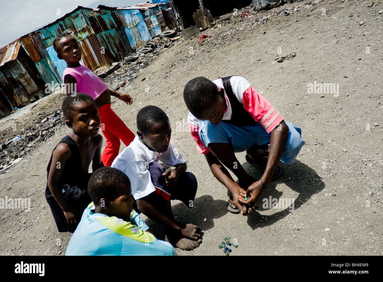 Children playing marbles hi-res stock photography and images - Alamy