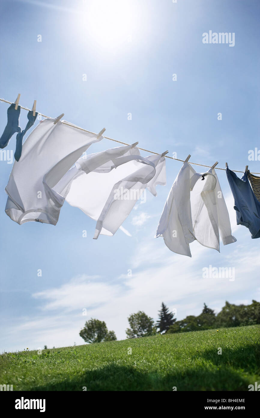 Clothes line in the sun Stock Photo - Alamy