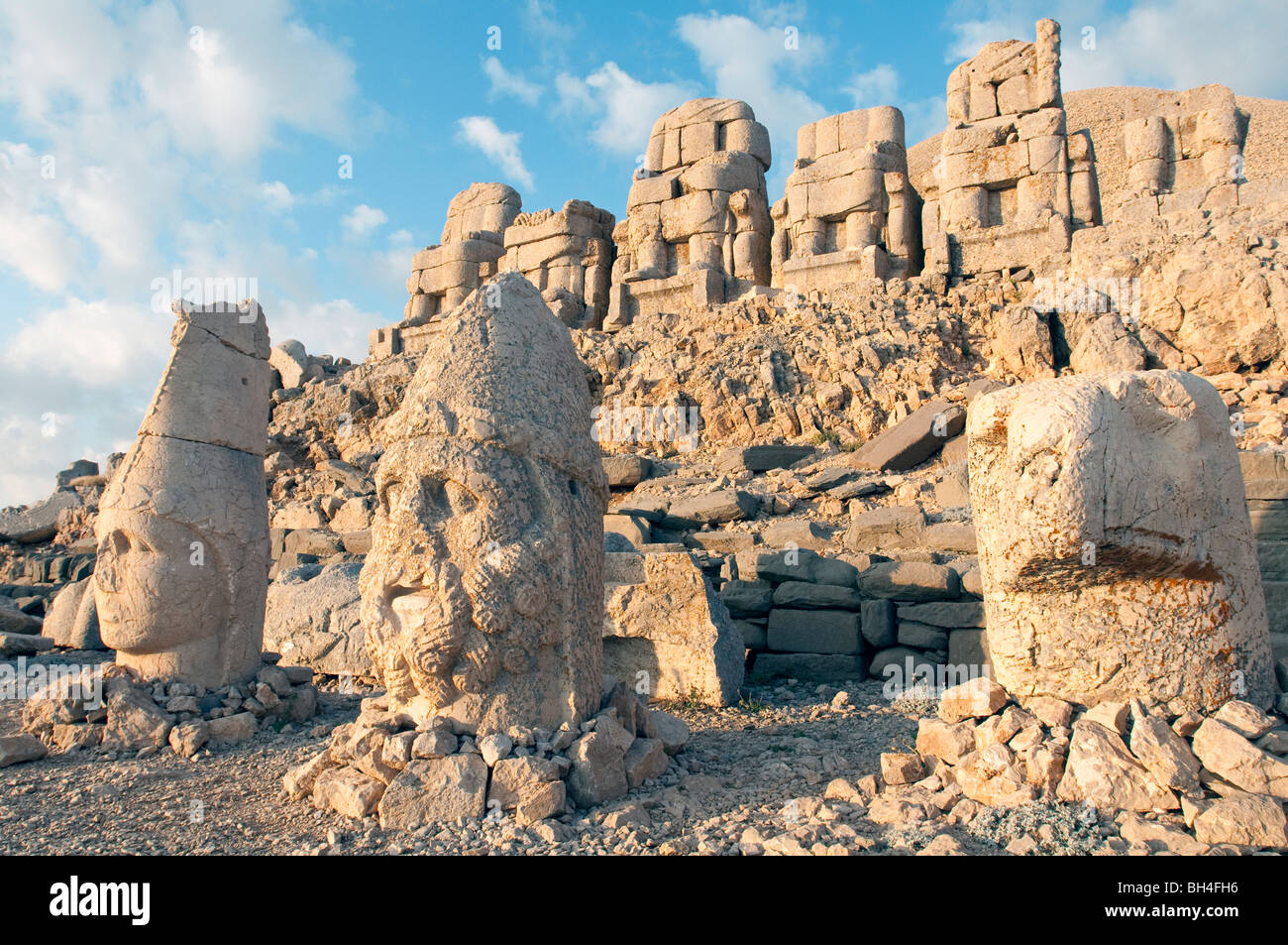 Heads of the gods, Apollo and Zeus (l-r) and an eagle, eastern terrace ...
