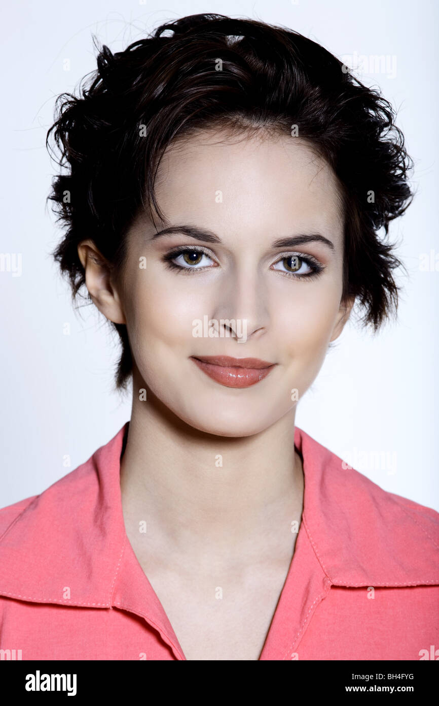 studio shot portrait on grey background of a Beautiful smiling French ...