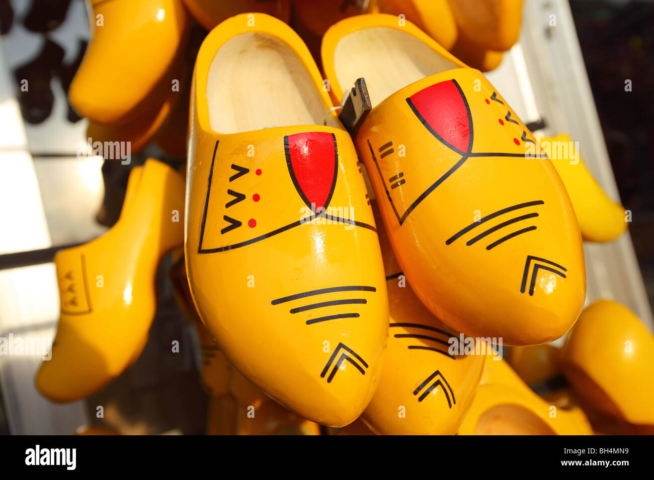 Dutch wooden shoes in Holland, yellow clogs Stock Photo - Alamy