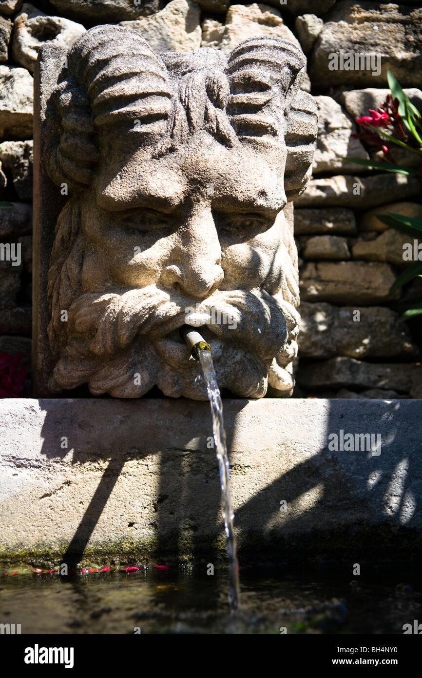 Stone water feature, Joucas, Provence, France Stock Photo - Alamy